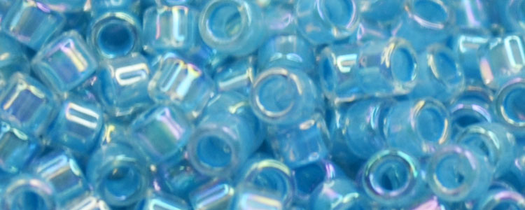 TOHO Aiko-Dark Aqua Lined Crystal Rainbow #TB-781 - Retail Bobby Bead